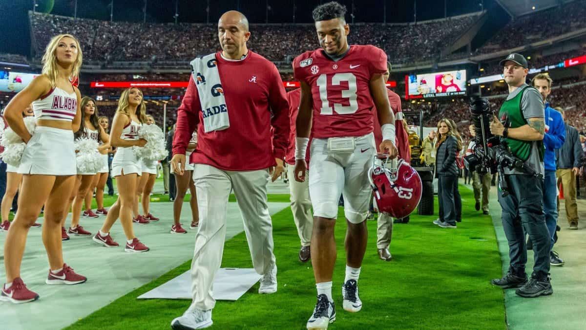 Tua Tagovailoa rushed to local hospital with apparent hip injury
