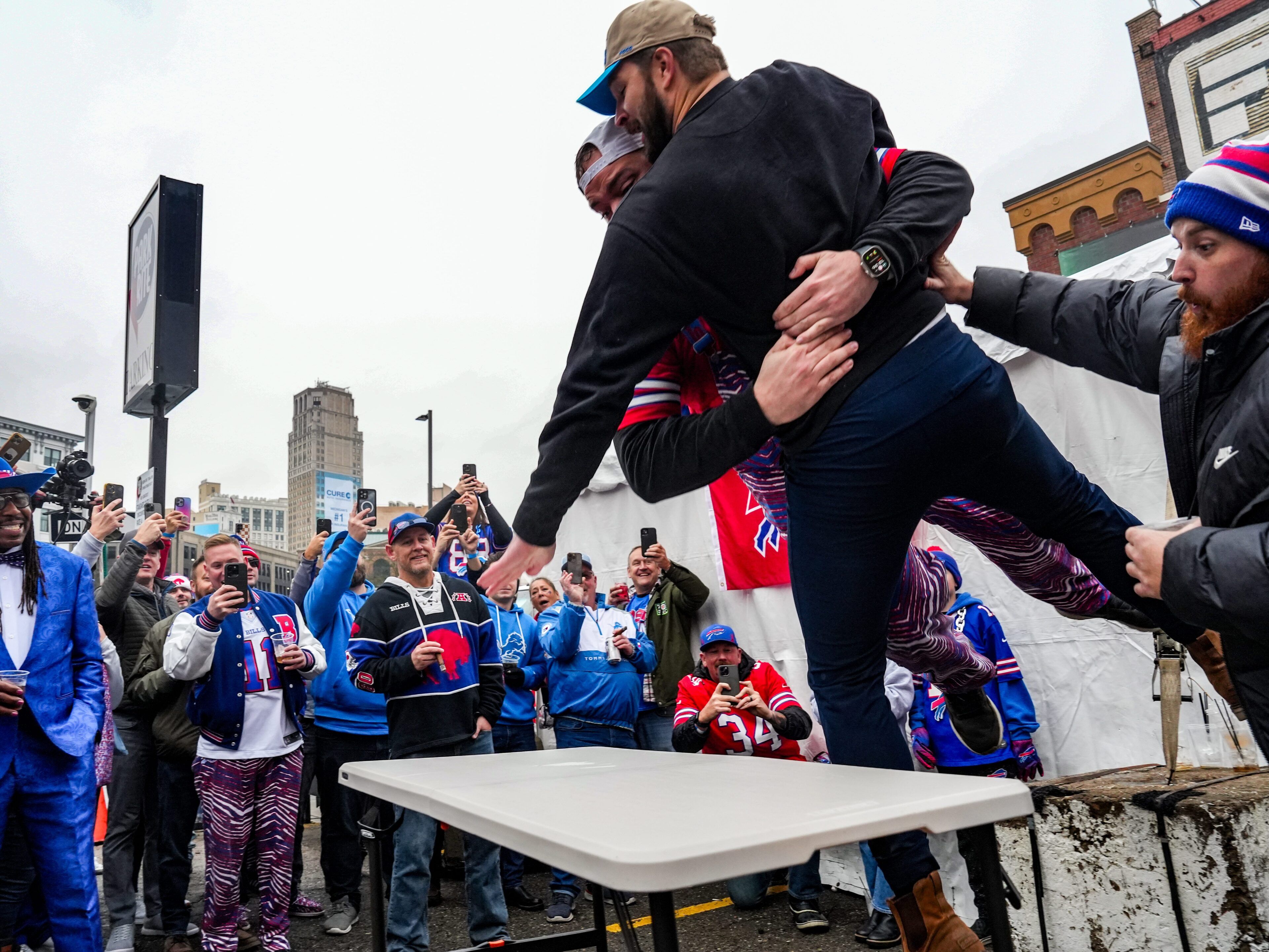 Why Do Bills Fans Jump Through Tables? Examining Buffalo's Viral Home ...