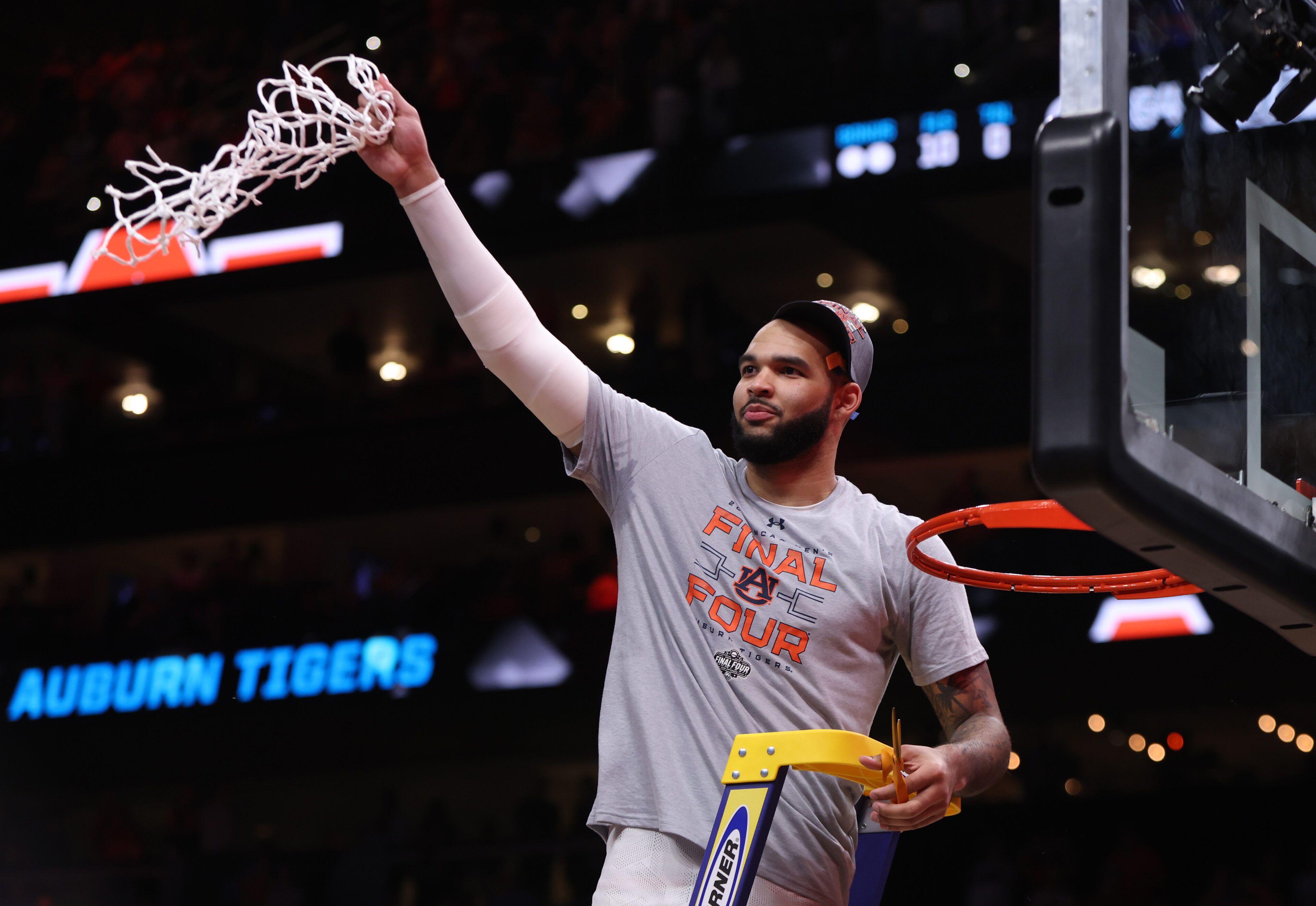 Who Are Johni Broome's Parents John and Julie? A Closer Look at the NBA ...