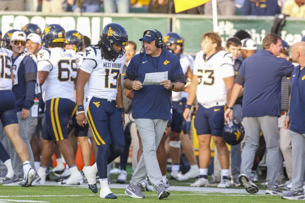 West Virginia HC Rich Rodriguez Refuses to Name QB1 vs Pitt With Strong ...