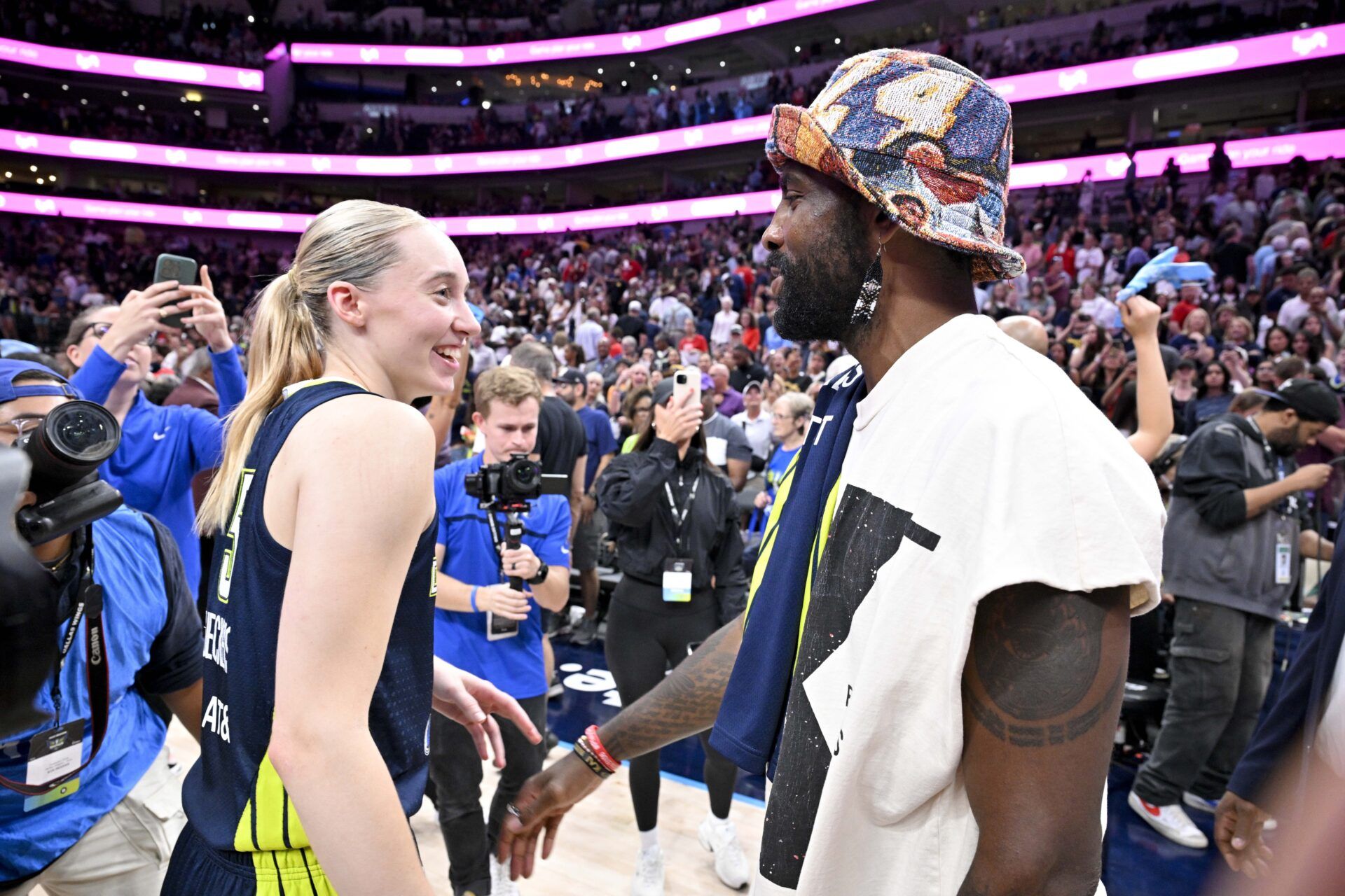 Mavericks All-Star Kyrie Irving Links Up With Wings Phenom Paige ...